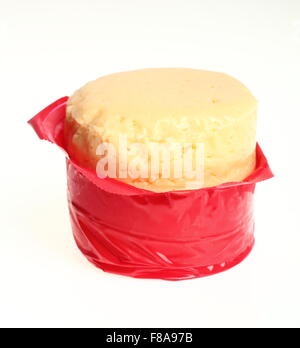 Cheese in red plastic package Stock Photo - Alamy