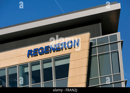 A logo sign outside of the headquarters of Regeneron Pharmaceuticals ...