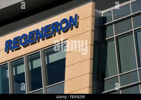 A logo sign outside of the headquarters of Regeneron Pharmaceuticals ...