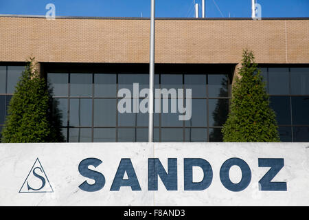 A logo sign outside of the headquarters of Sandoz Pharmaceuticals in ...