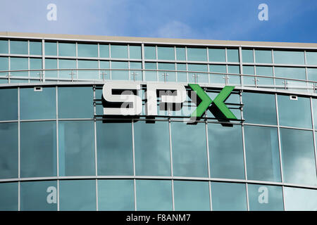 A logo sign outside of the headquarters of the SPX Corporation in ...