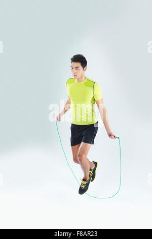 Man jumping rope Stock Photo - Alamy