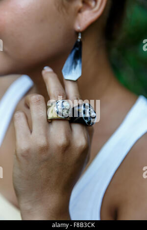 latin girl showing handmade rings Stock Photo - Alamy