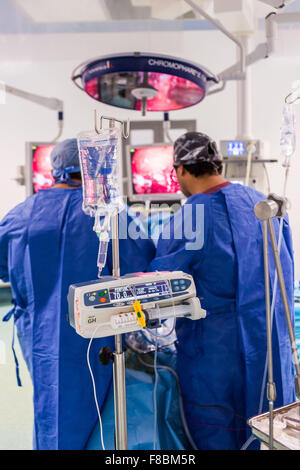 Surgical team performing prostatectomy (prostate ablation) under ...