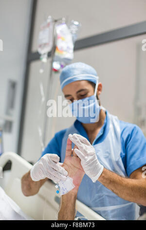 Patient hand in physical therapy physiotherapy clinic in medical center ...