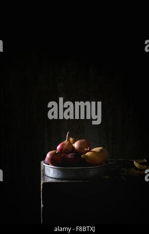 Raw Fresh Shallot onions Bulbs in a wooden market box. Dark Wooden ...