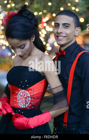 Puertorican (hispanic) teenager couple participating at a quinceanera ...