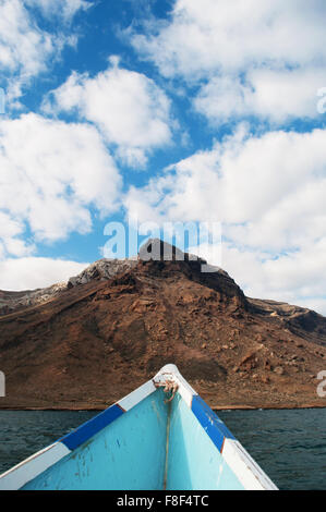 Yemen, Middle East: a boat and the cliffs of Ras Shuab, Shuab Bay beach ...