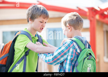 Two Boys Fighting In School Playground Stock Photo - Alamy