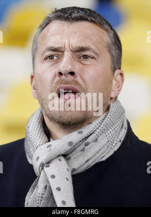 Kiev, Ukraine. 09th Dec, 2015. Denys Garmash (2-L) of Dynamocelebrate a ...