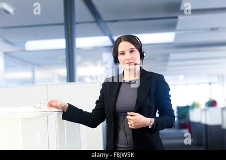 Telephonist in office Stock Photo - Alamy