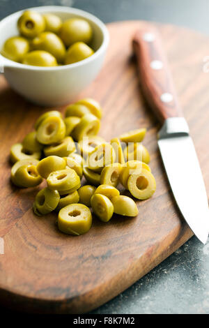 Marinated pickled green olives snack in the bowl Stock Photo - Alamy