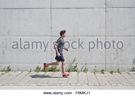Young man passed out on sidewalk in downtown Seattle Stock Photo ...