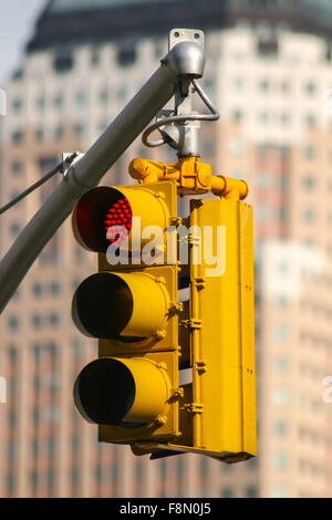 A close-up image of a red scoreboard with the words 'Home' and 'Guest' written in bold white ...
