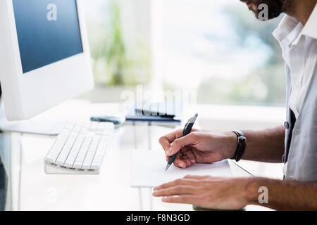 Side View Of A Young Businessman Taking Photo Of Bill On Smartphone ...