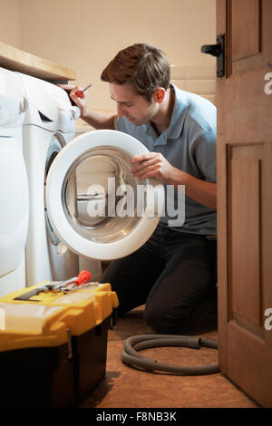 Engineer Mending Domestic Washing Machine Stock Photo - Alamy