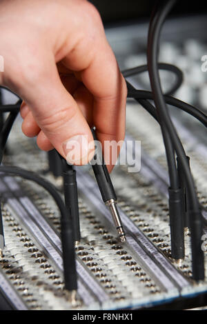 Hand Plugging Cable Into Recording Studio Patch Panel Stock Photo - Alamy