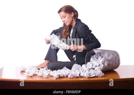 Woman with lots of discarded paper Stock Photo - Alamy
