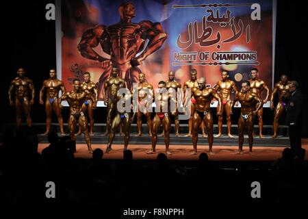 Tripoli, Libya. 10th Dec, 2015. Bodybuilding athletes show their muscle ...