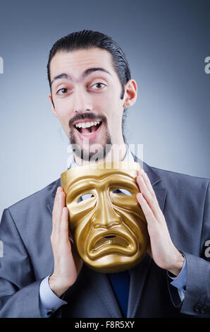 Businessman with mask concealing his identity Stock Photo - Alamy