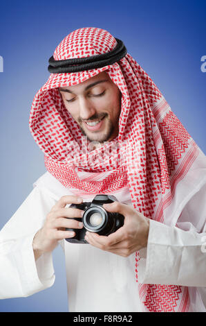 Arab photographer in studio shooting Stock Photo - Alamy