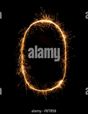 0.Digit zero made of firework sparklers at night background Stock Photo ...