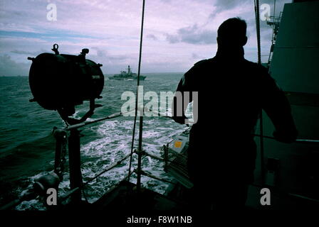 AJAXNETPHOTO. AT SEA. - A SHIP'S ALDIS LAMP IN USE TO SEND SIGNALS TO ...