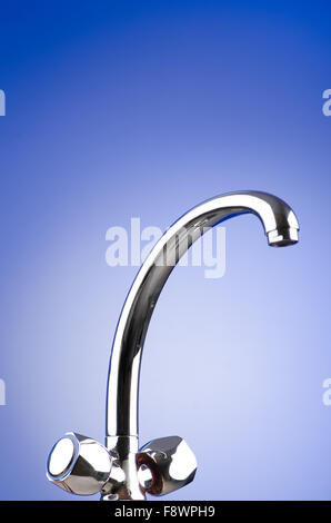 Shiny tap on the gradient Stock Photo - Alamy