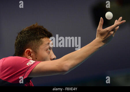 South Korea's Jang Woojin serves against Taiwan's Lin Yun-ju during ...