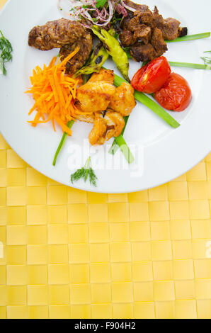 Plate with tasty lamp kebabs Stock Photo - Alamy
