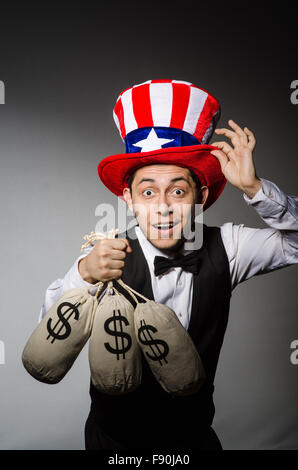 Funny man with money dollar sacks Stock Photo - Alamy