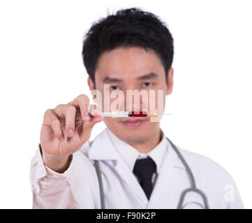 A young Asian doctor holding blood sample test tube on white background ...