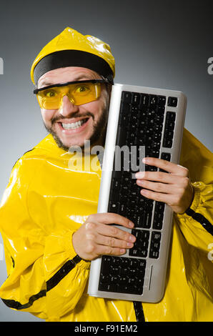 Man wearing yellow suit with keyboard Stock Photo - Alamy