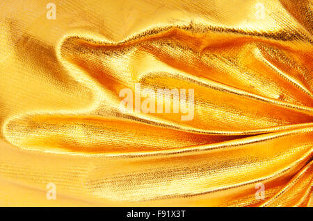 Shiny surface of gold photo reflector Stock Photo - Alamy