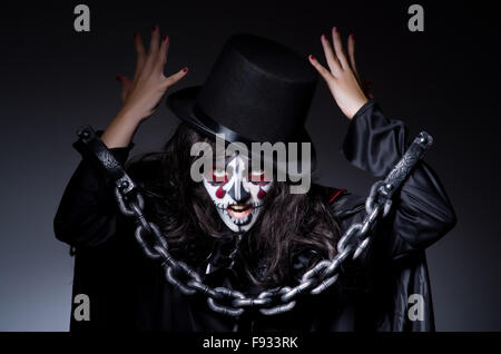 Monster chained in dark room Stock Photo - Alamy