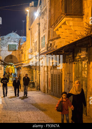 Walking in the Muslim quarter in the old city of Jerusalem Stock Photo ...