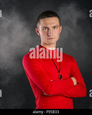 Professional fitness coach isolated on white background Stock Photo - Alamy