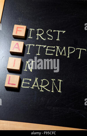 FAIL acronym First Attempt In Learning handwritten with white chalk ...