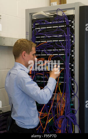 Apprentice IT student testing server Stock Photo - Alamy