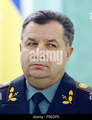 Ukrainian Defense Minister Stepan Poltorak salutes as he reviews the ...