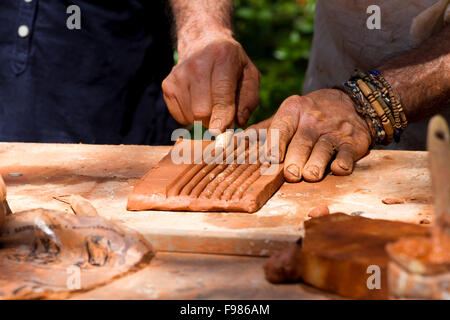 Men at work, clay craftsman Stock Photo - Alamy