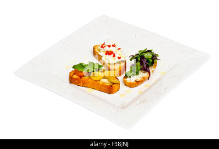 different colored Canapes on a white background Stock Photo - Alamy