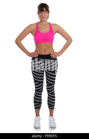 A young fitness woman is standing on a rock in the river Stock Photo ...