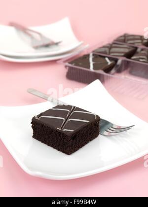 Chocolate Mud Cake Slices Stock Photo - Alamy