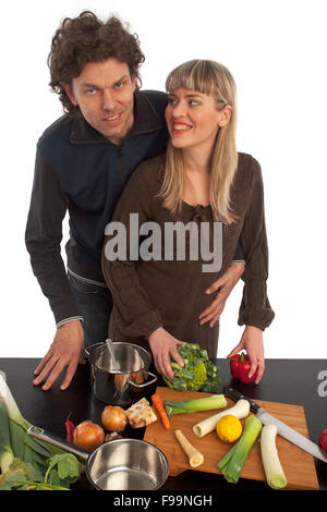 happy couple cooking insolated on white Stock Photo - Alamy