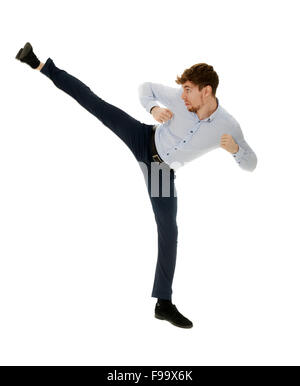 Young businessman fighter in a combat posture, ready to take on any ...