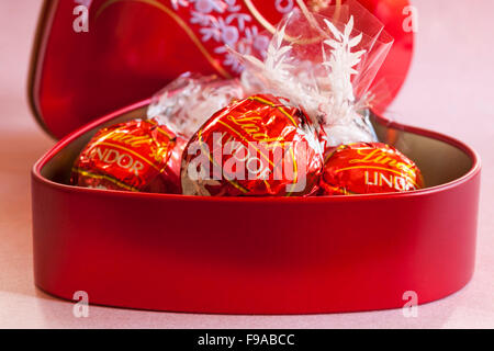 Red and pink heart-shaped chocolates for Valentine's Day Stock Photo ...