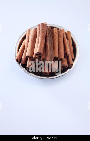 cinnamon stick on the silver container Stock Photo - Alamy