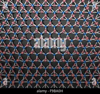 Model of hexagonal transition metal dichalcogenide monolayer (TMD). A ...