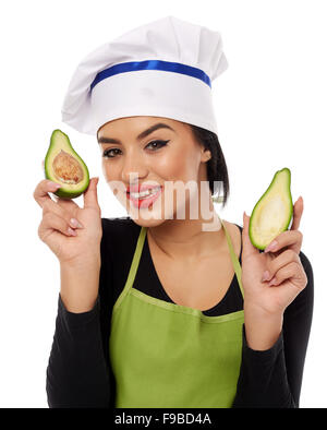 Female hand holding healthy avocado toast. ripe hass avocado ...